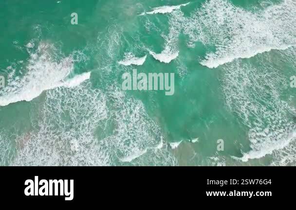 Waves in the sea. Waves of water. Ocean whirlpools. Aerial sea beach ...