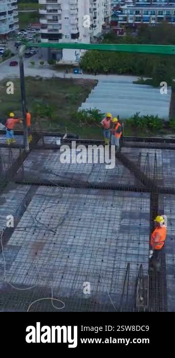 Laying concrete foundations for a high-rise building Stock Video ...