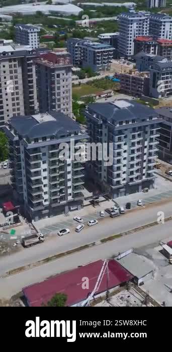 Active building sites transform a vibrant coastal town Stock Video ...