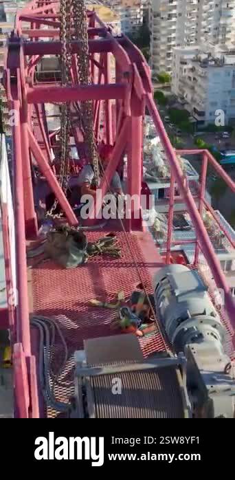 Professional Labor Carefully Constructing A Crane Step By Step Stock ...