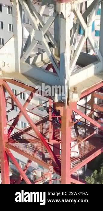 Professional Labor Constructing A Crane Piece By Piece With Safety ...