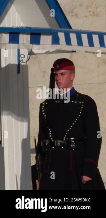 Greek Presidential Guard evzone in national clothes uniform at the tomb ...