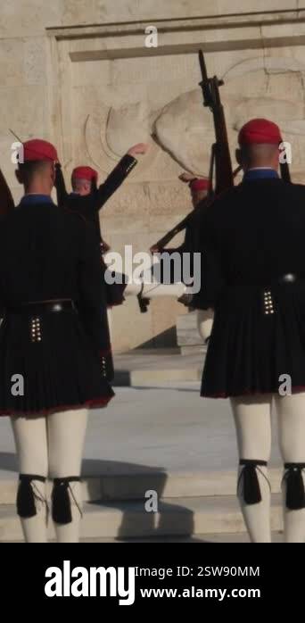 Greek Presidential Guard evzone in national clothes uniform at the tomb of unknown soldier in ...