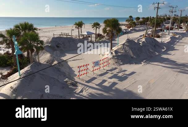 Hurricane aftermath cleanup. Piles of debris on street side in Florida ...