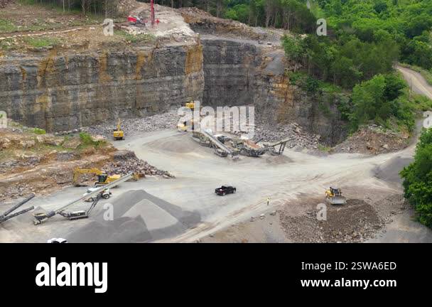 Industrial gravel quarry. Open pit mining site of limestone materials ...