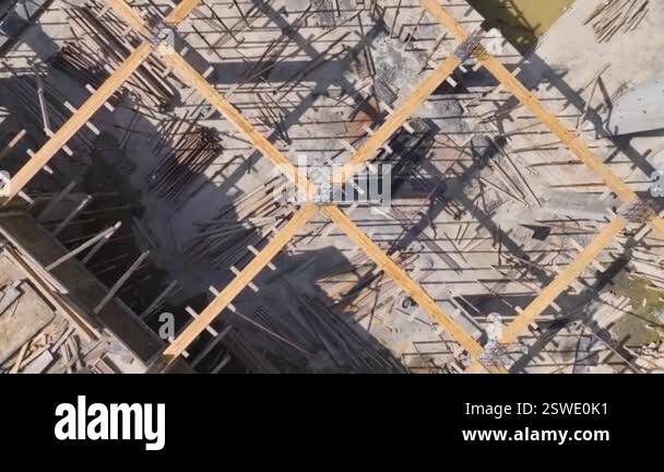 An active construction site with machinery and workers collaborating to ...
