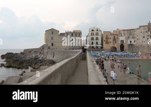 Cefal, Italy - September, 2024: View of the beach in Cefal with ...