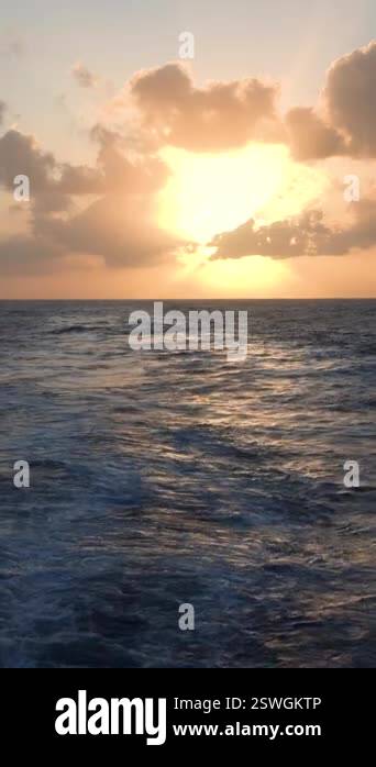 Powerful waves behind ocean going cruise ship cruising across the sea ...