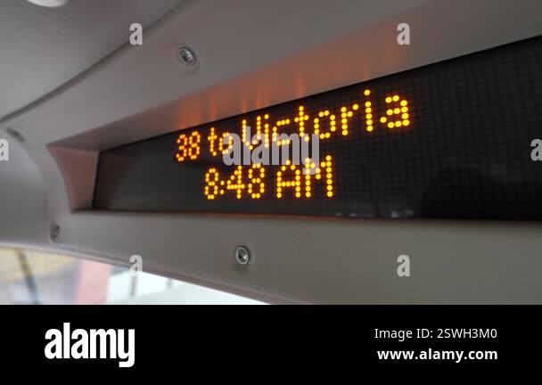 A digital display inside a city bus shows the route 38 to Victoria at 8 ...