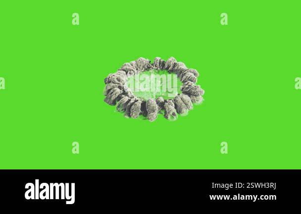 Small explosion with debris flying upward, captured on a green screen ...