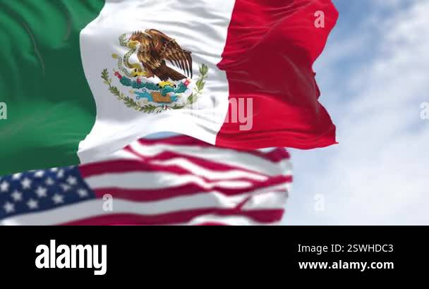 Mexico and US national flags waving on a clear day. Seamless 3d render ...