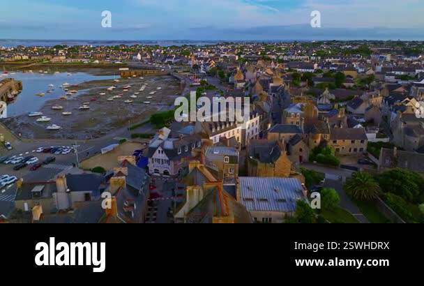 Aerial view of Roscoff cityscape, with Roscoff jetty in the background ...