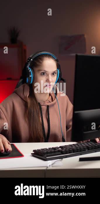 Female gamer streamer playing video games streaming online doing happy ...