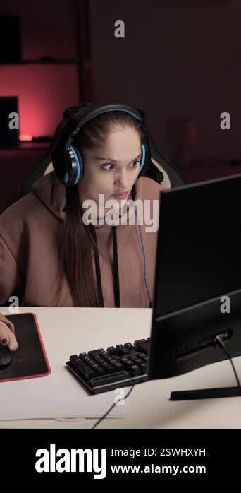 Gaming at home concept. Gamer woman playing online video game using ...