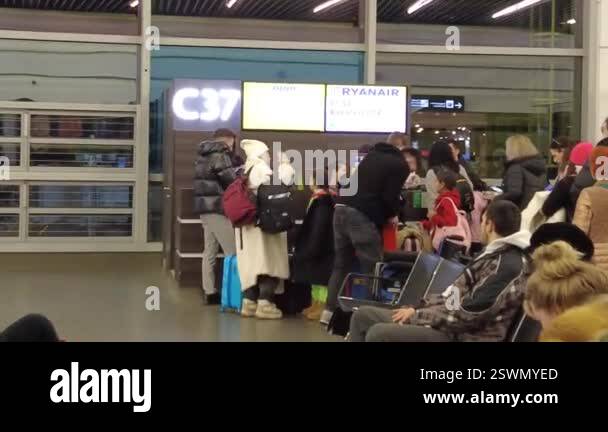 Vienna, Austria - January 18, 2025: Passengers at the boarding gate ...