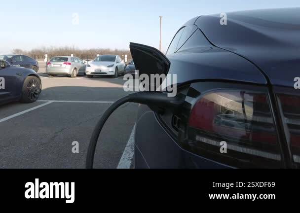 Europe, Italy, Milan . Tesla cars showroom presents the new Model x to ...