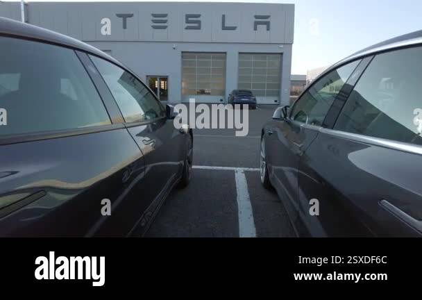 Europe, Italy, Milan . Tesla cars showroom presents the new Model x to ...