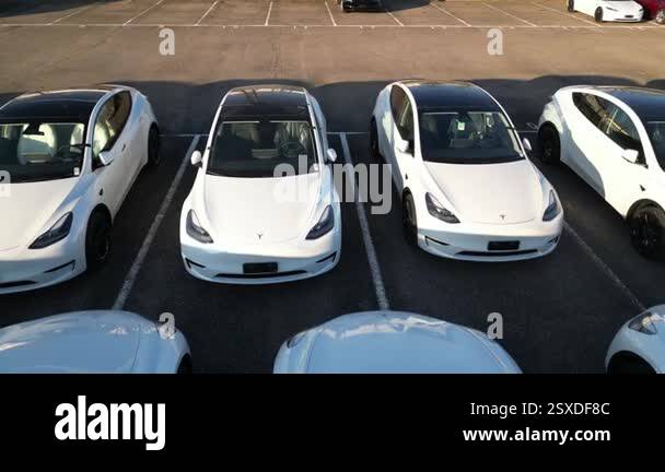 Europe, Italy, Milan . Tesla cars showroom presents the new Model x to ...