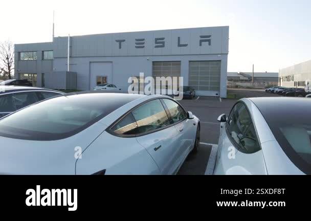 Europe, Italy, Milan . Tesla cars showroom presents the new Model x to ...