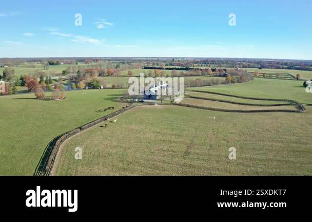 Aerial view of stables and fences of a horse farm in Central Kentucky ...