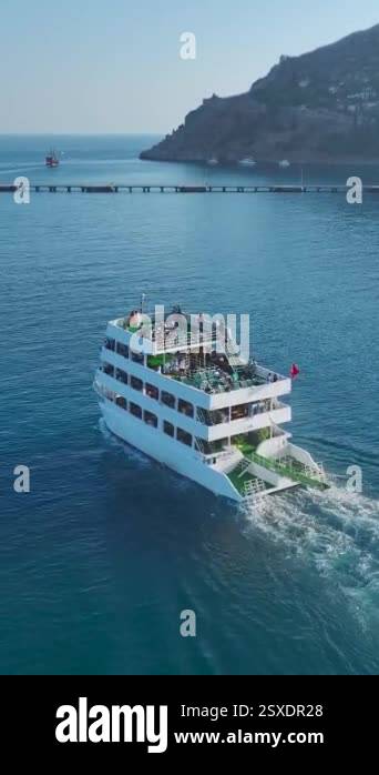 Enjoy the scenic view of cloud-covered mountains, green forests, and ...