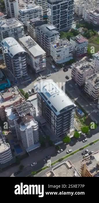 Vertical Video: Active Construction Scene With Workers and Engineers ...