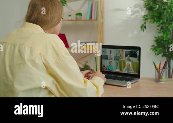 Person taking part in online class. Woman college student studying at ...