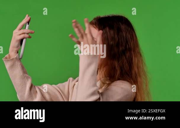 Children emotions concept. Little girl child holding smartphone and ...