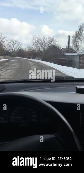 vertical video driver controls car. first person video driver behind ...
