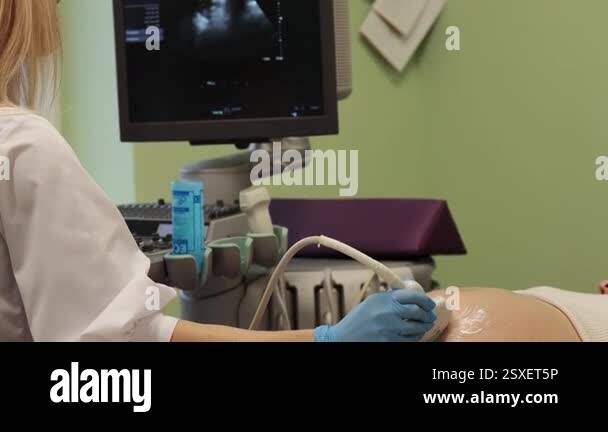 Gynecologist uses ultrasound scanner for gynecology checkup and tells ...