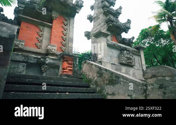 A scenic view of ancient Balinese temple architecture featuring stone ...