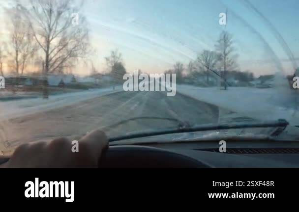 Windshield Wipers Clean Car Windshield From Frozen Precipitation During ...