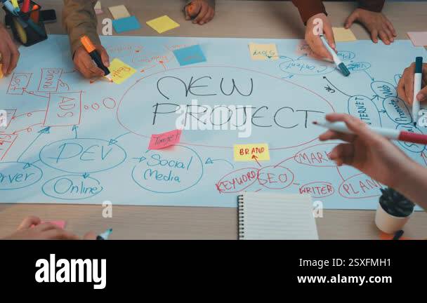 A vibrant collaborative session captured in an office where individuals ...
