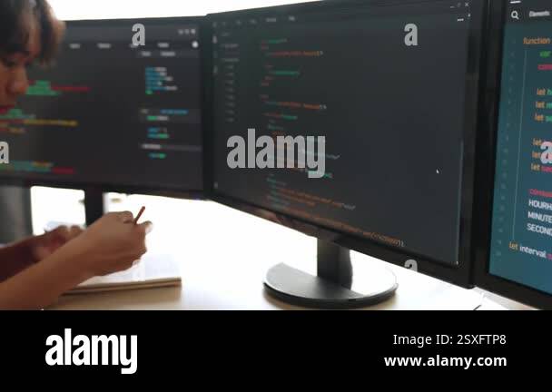 Slow motion back end software developer engineer for computer programming working together on ...