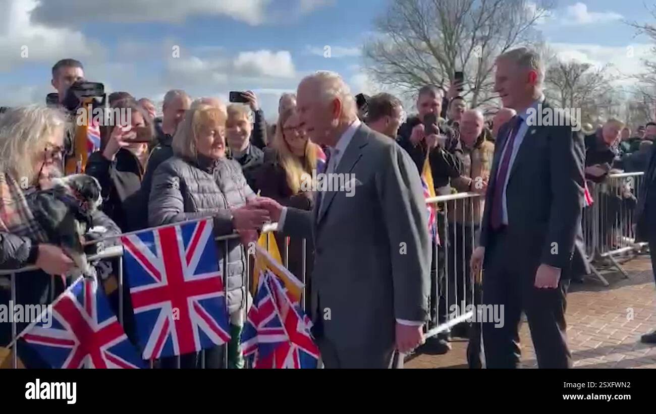 King greeted by cheering crowds at JCB headquarters in Staffordshire ...