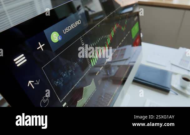 No people closeup of computer screen with dynamic stock market data, on ...