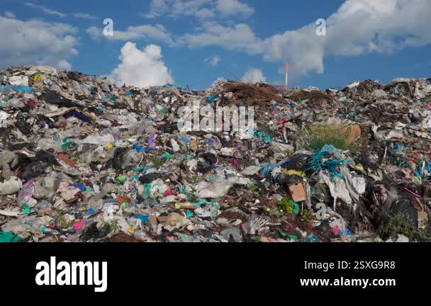 This footage highlights a large landfill site showcasing the ongoing ...