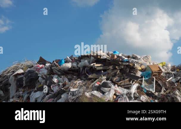 A landfill showcasing heaps of garbage, emphasizing the urgent need for ...