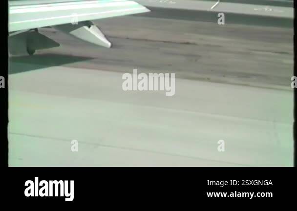 The footage, captured from an analog video, shows a view from an ...