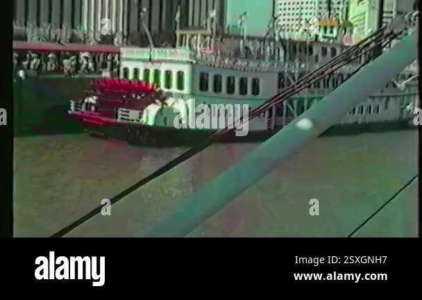 The paddlewheeler Creole Queen, with its striking red paddlewheel at ...