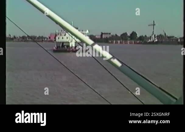 A steamboat is seen on the water in New Orleans from a distance, viewed ...