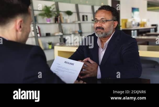 Senior Indian job candidate talking to company recruiter, HR manager ...