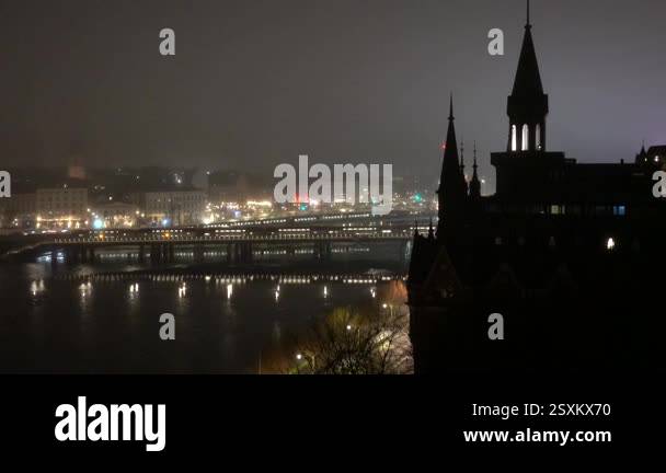 Stockholm, Sweden A view of the Slussen district in the fog at night ...