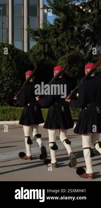 Greek Presidential Guard evzone in national clothes uniform at the tomb ...