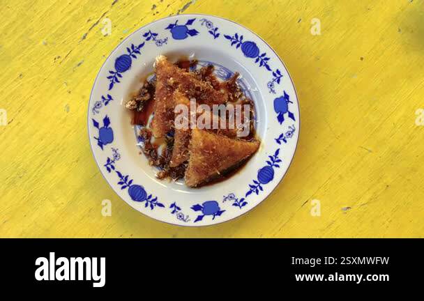 Lupis Indonesia traditional sweet cake, glutinous rice with triangle ...