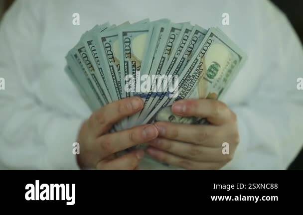 Stack hundred dollar bills Stock Videos & Footage - HD and 4K Video Clips - Alamy