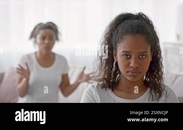 Two sisters find themselves in a moment of tension at home. While one ...
