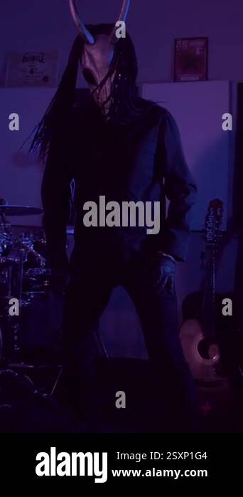 Vertical. Devil Monster Suffers, Dances, Gets Angry. A mystical man in ...