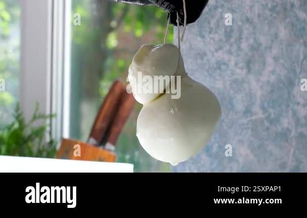 hands of skilled unrecognizable female factory worker in rubber gloves ...