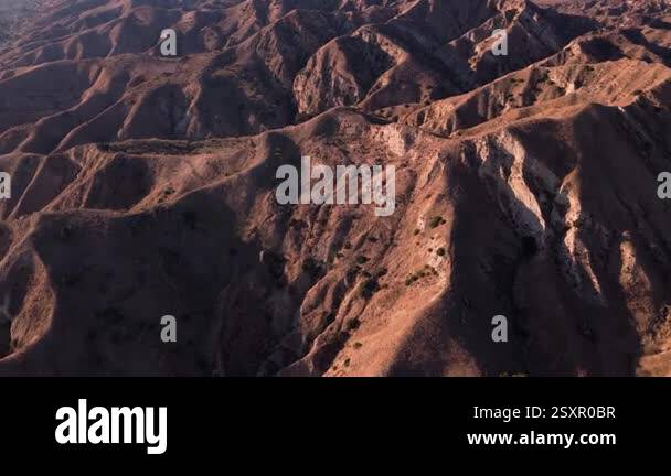 Breathtaking aerial footage capturing the dramatic terrain of rugged ...